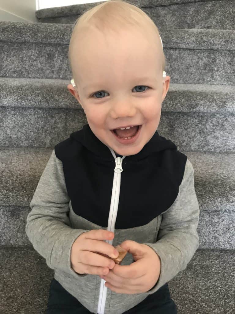 After cochlear implant activation day, child begins journey to speaking